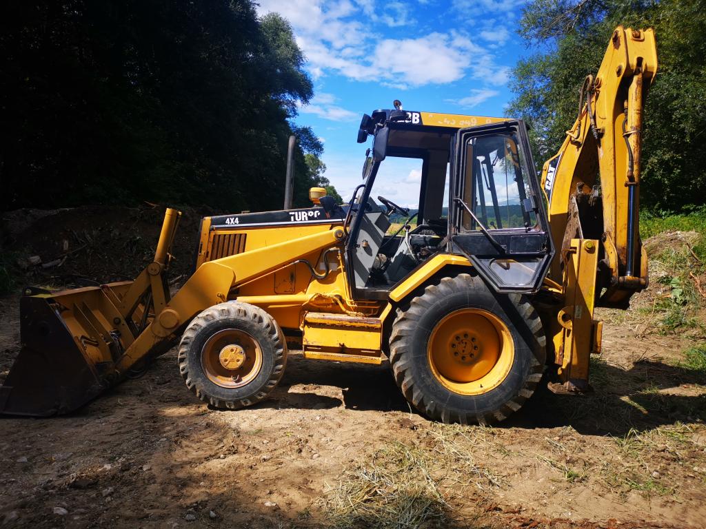 Traktorgrävare - CAT 428B | Blinto auktioner