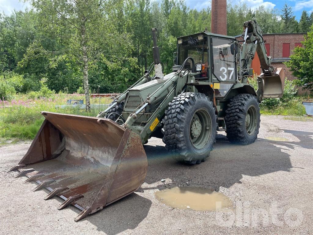 Traktorgrävare - Huddig 960 | Blinto