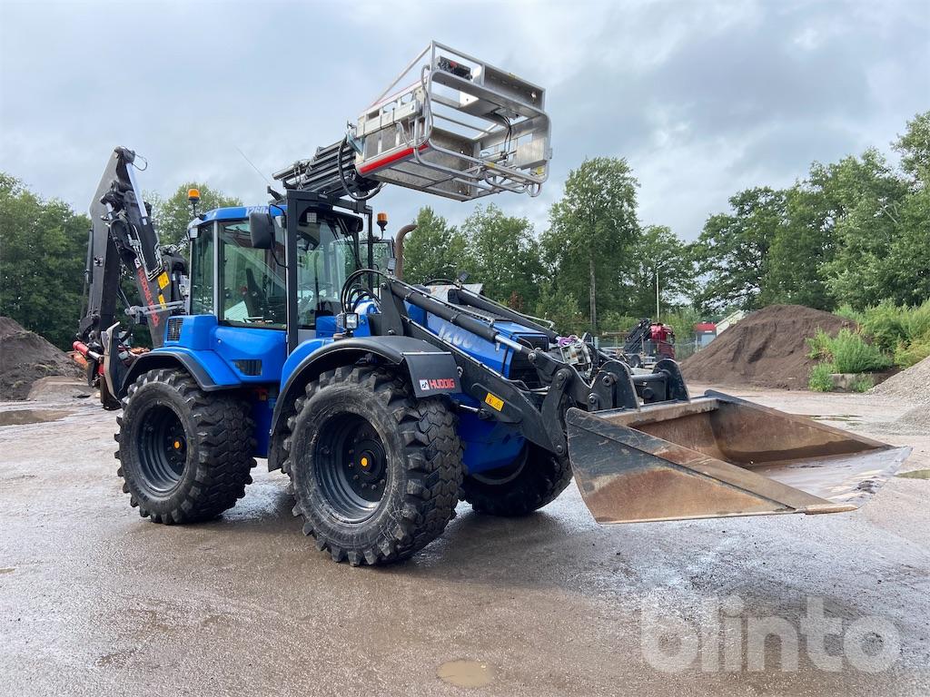 Traktorgrävare - HUDDIG 1260B | Blinto auktioner