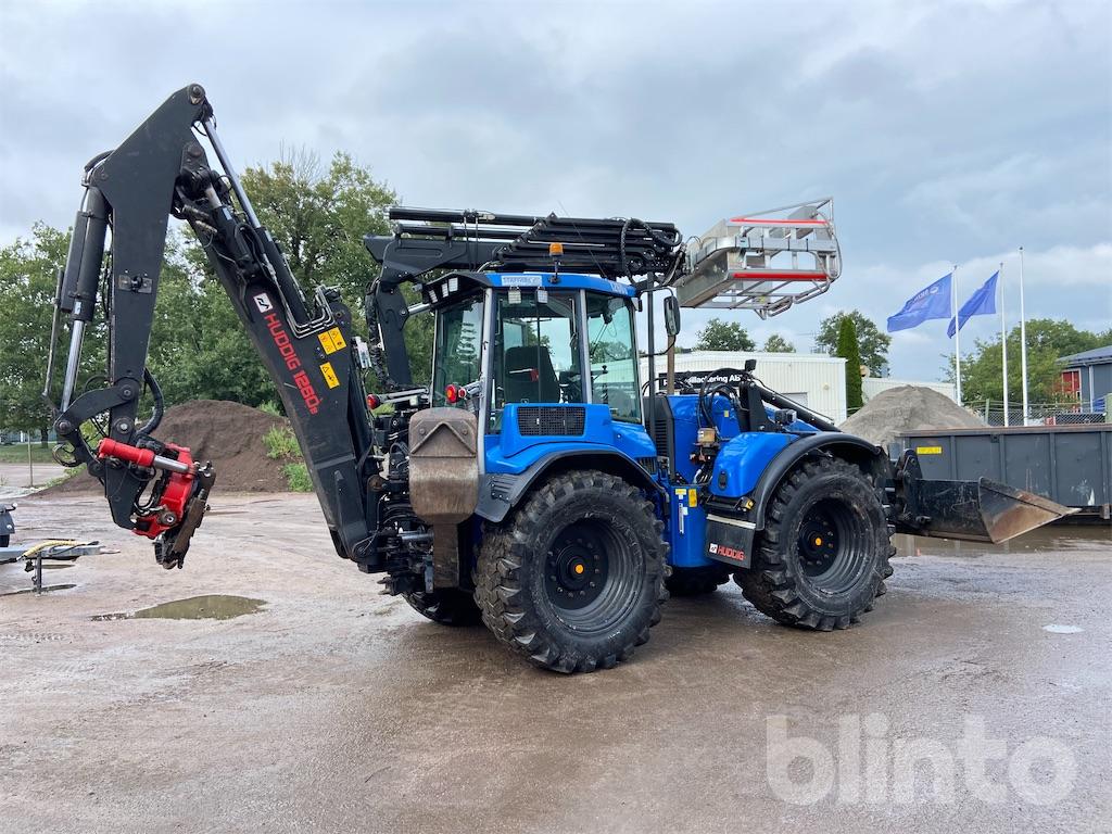 Traktorgrävare - HUDDIG 1260B | Blinto auktioner