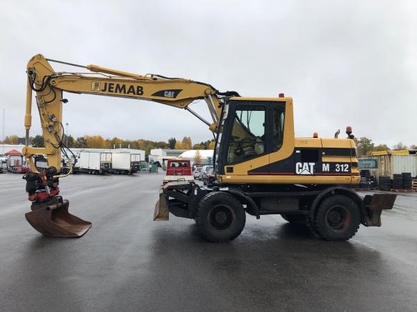 Hjulgrävare - Cat M312 | Blinto auktioner