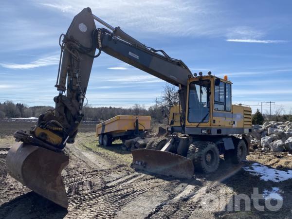 Hjulgrävare - Volvo EW 200 med Encon | Blinto auktioner