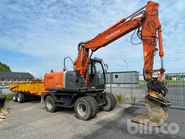 Hjulgrävare + kärra - Hitachi ZX 140W | Blinto auktioner