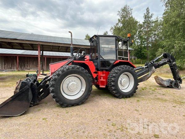 Traktorgrävare - Huddig 960 med skopor | Blinto auktioner