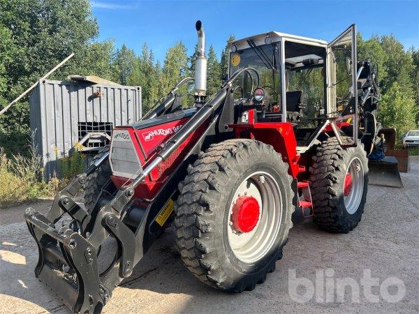 Traktorgrävare - Huddig 960 Cummins | Blinto auktioner