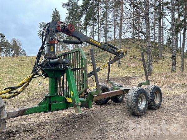 Skogsvagn - Farma 7.5 ton | Blinto auktioner